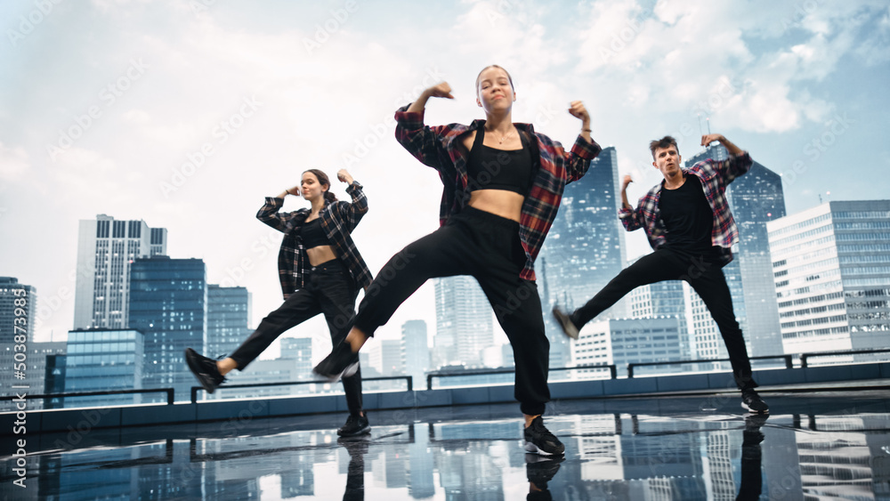 Diverse Group of Three Professional Dancers Performing a Hip Hop Dance ...