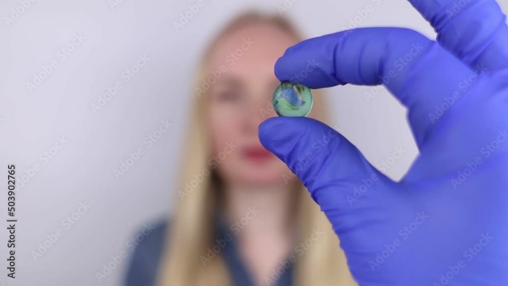 Conceptual shot of an eye crystalline lens replacement. Ophthalmic ...