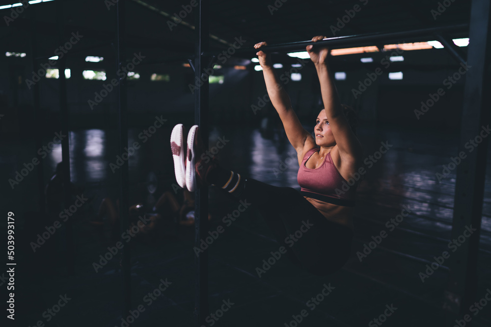 Strong athlete have hard morning workout in sportive cardio gym with ...