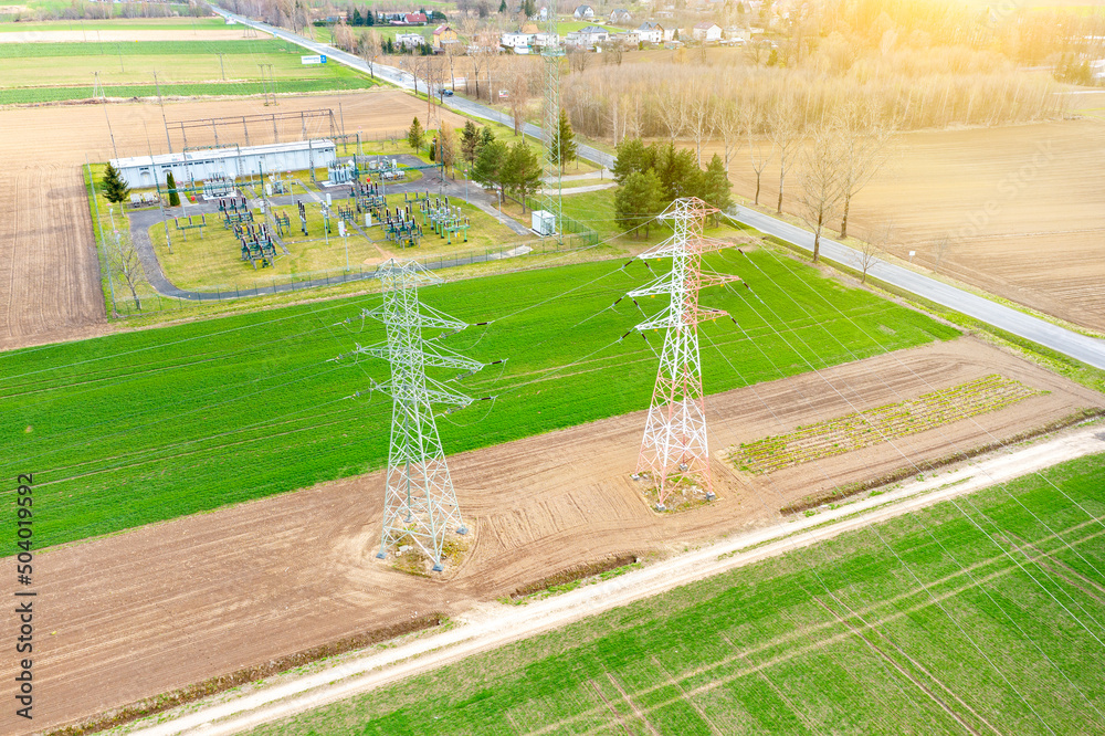 Top view of electrical substation among fields, aerial view of high ...