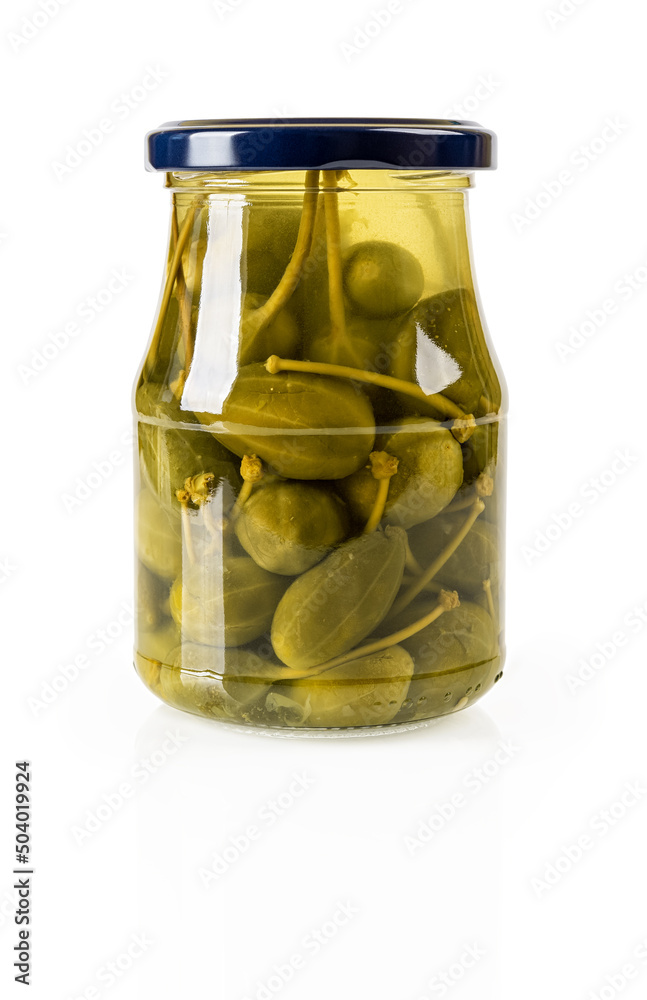 Pickled caper berries in a glass jar isolated on white background. Full ...