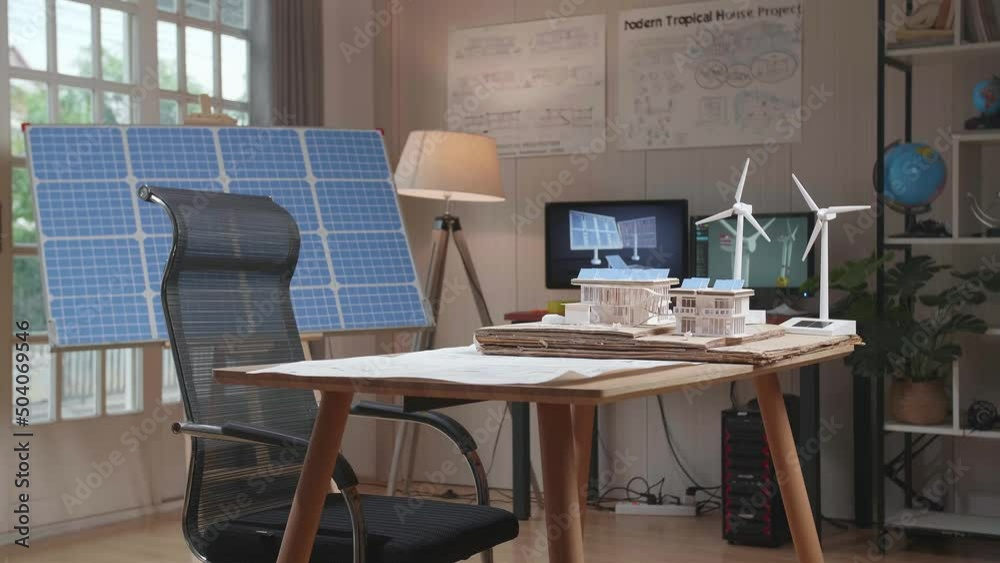 The Office That Has Solar Cell Next To The Model Small House With Solar ...