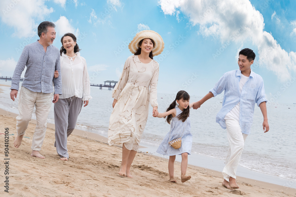 Happy family on holiday at the seaside Stock Photo | Adobe Stock