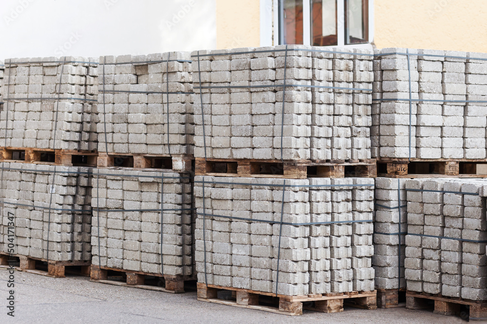 Cobblestones pallets for paving under construction. Concrete Blocks for ...