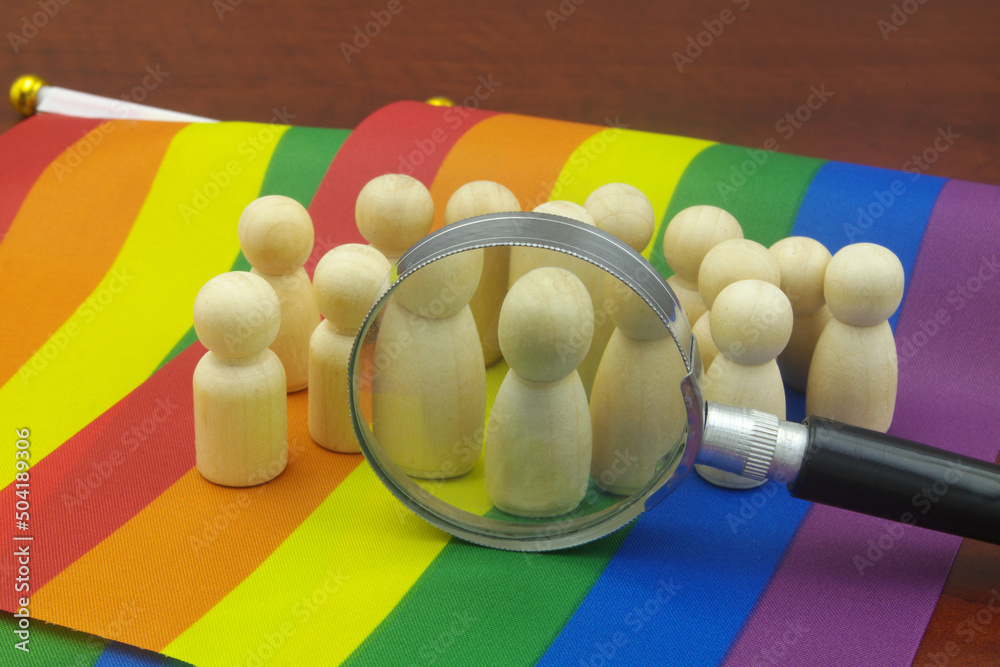 LGBT people community review concept. Many wooden people figures on ...