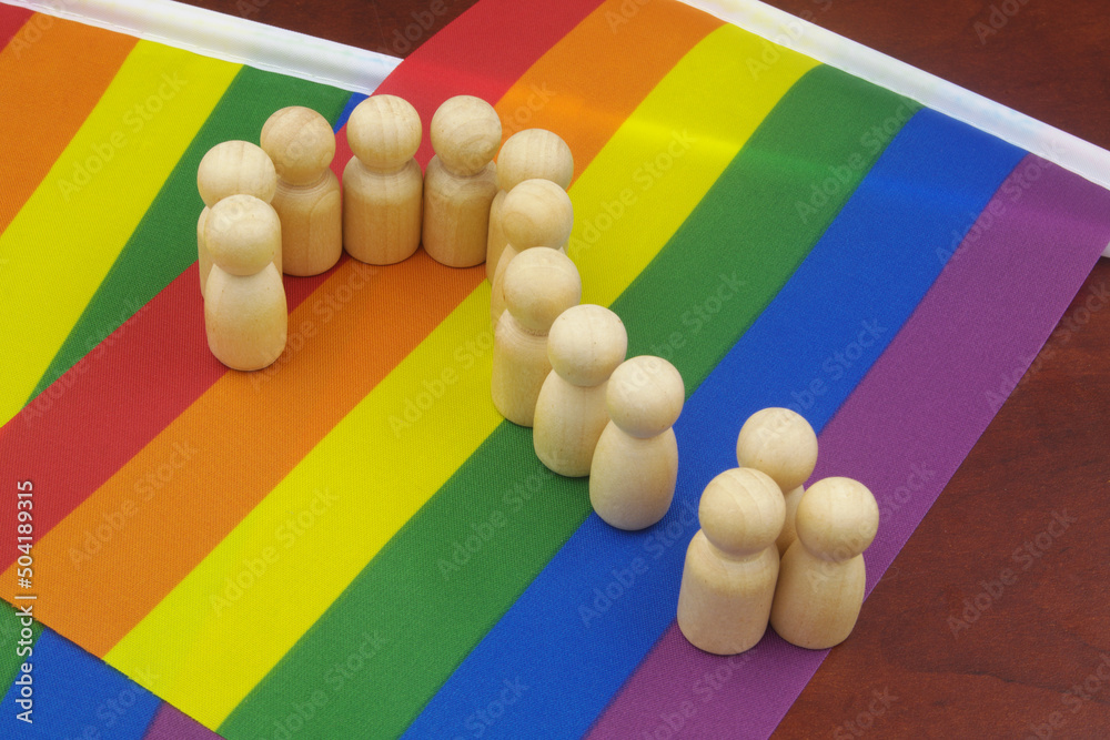 LGBT community faq concept. Female and male wooden people figures ...