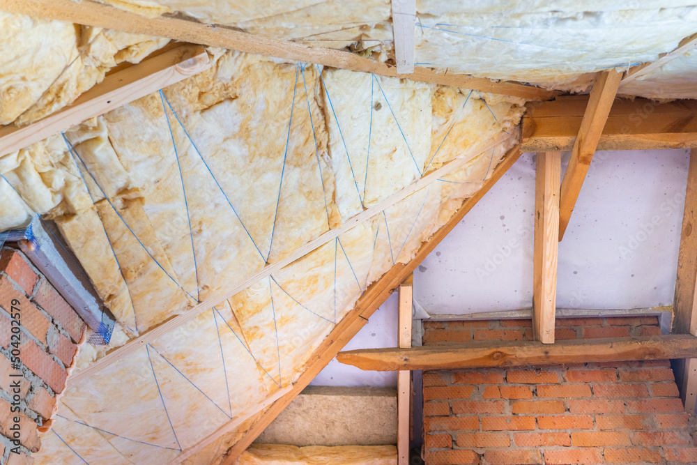 The roof is insulated with yellow glass wool. Proper roof insulation ... The roof is insulated with yellow glass wool. Proper roof insulation ...