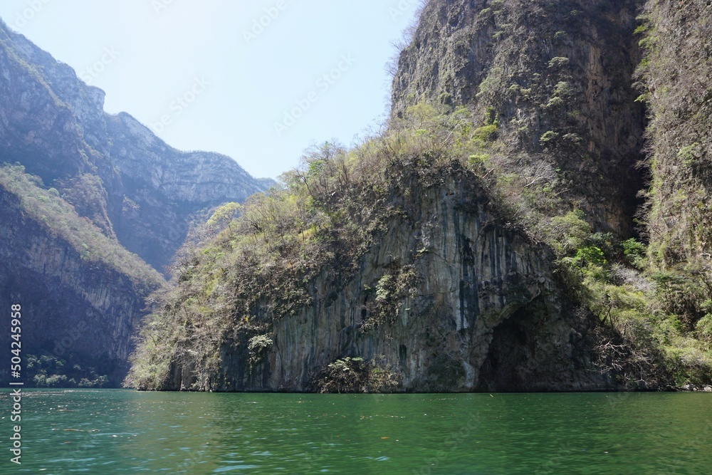 Sumidero Canyon (Spanish: Cañón del Sumidero) is a deep natural canyon ...