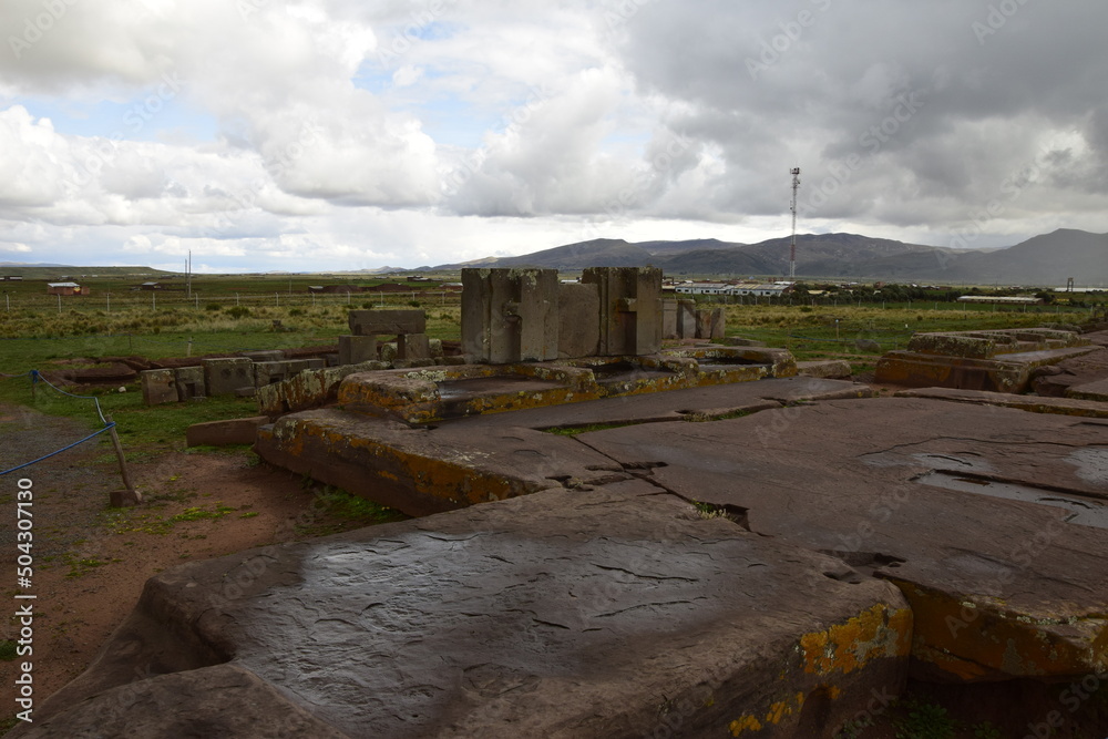 Stone walls uncovered by archaeologists at the Puma Punku, a UNESCO ...