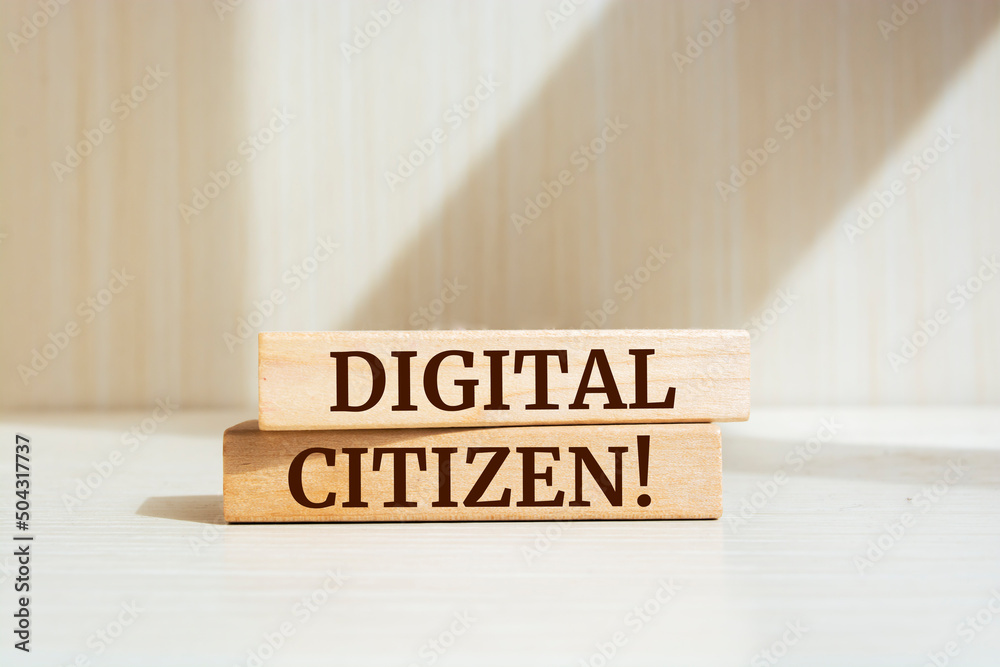 Wooden blocks with words 'Digital citizen'. Business, technology ...