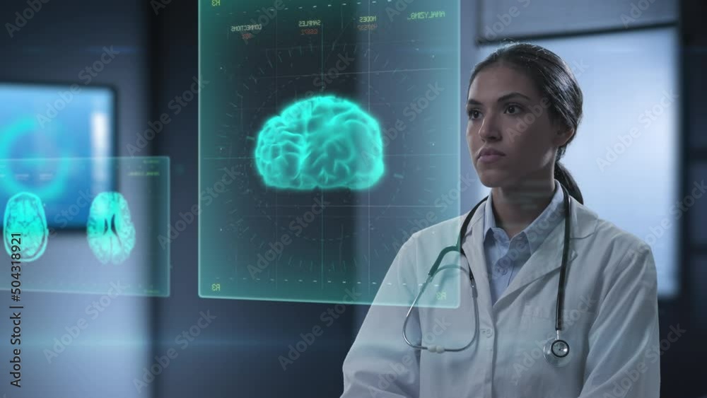 medical technology female doctor using graphic interface touchscreen to ...