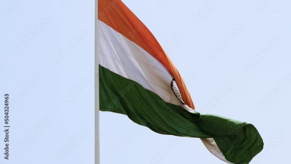 India flag flying high with pride in blue sky, India flag fluttering ...