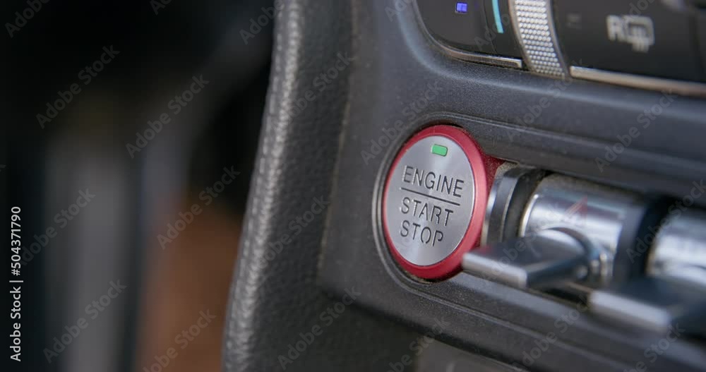 Driver presses the emergency stop button in the car Stock ビデオ | Adobe Stock