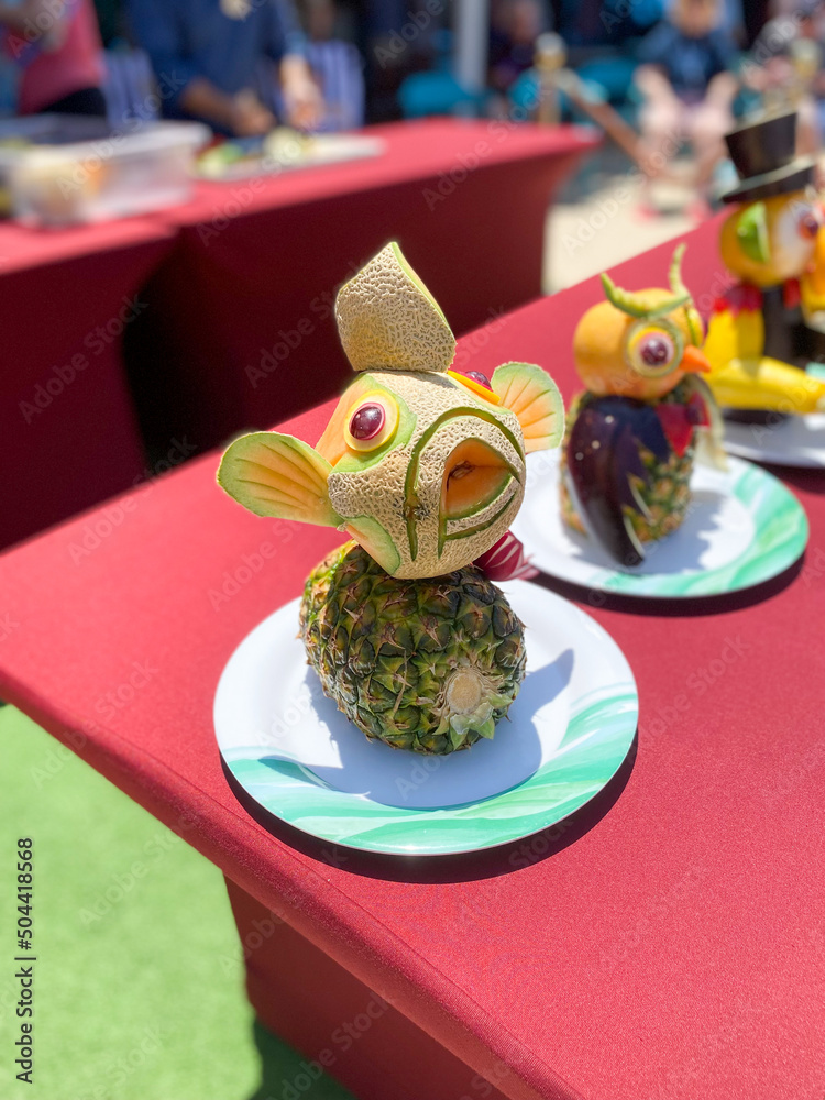 Cantaloupe fish fruit carving on cruise ship. Cruise ship chef and ...