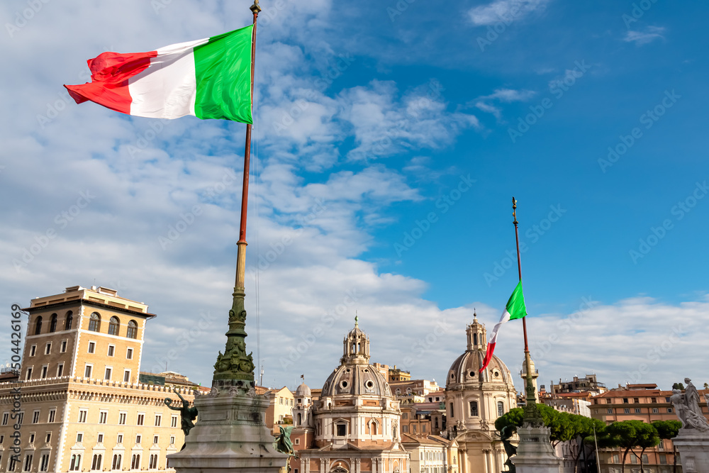 Italian national flag moving in wind with view on dome of Santa Maria ...