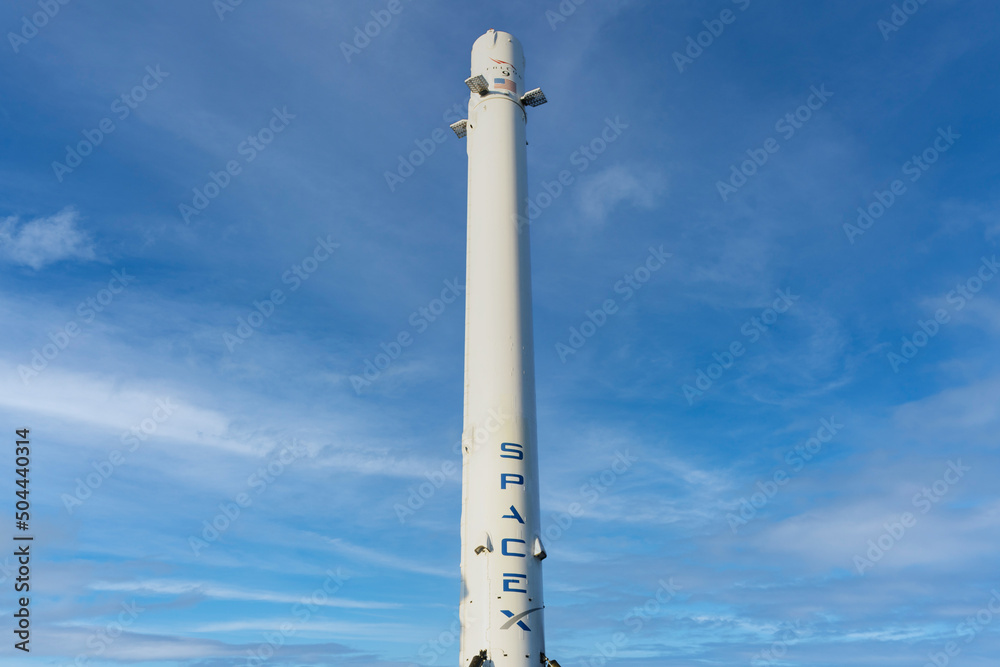 SpaceX sign logo on Falcon 9 rocket booster displayed at SpaceX ...
