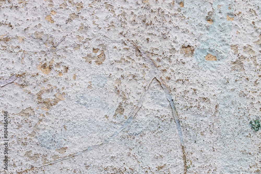 Peeling plaster on an old painted wall. texture background. Gray ...