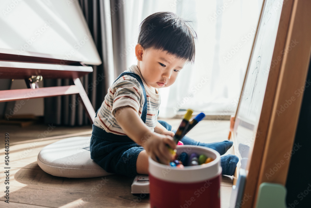 Asian little baby boy drawing Stock Photo | Adobe Stock