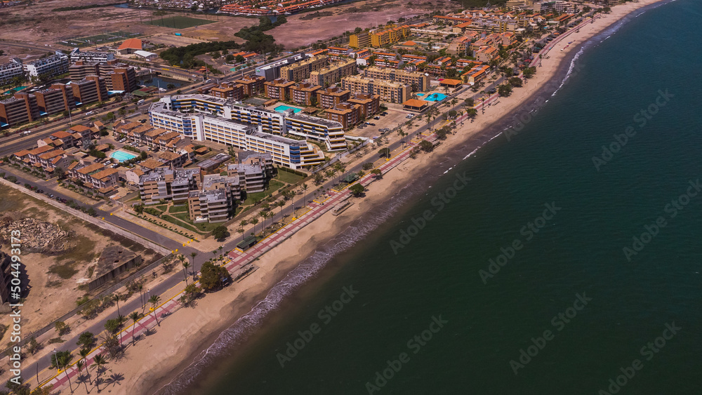 Photos from an aerial view of a drone, of a beach on a cloudy day from ...