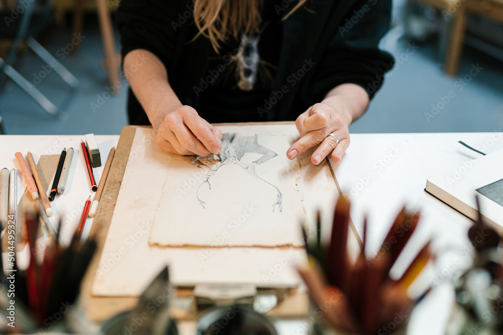 Crop artist creating graphic illustration Stock Photo | Adobe Stock