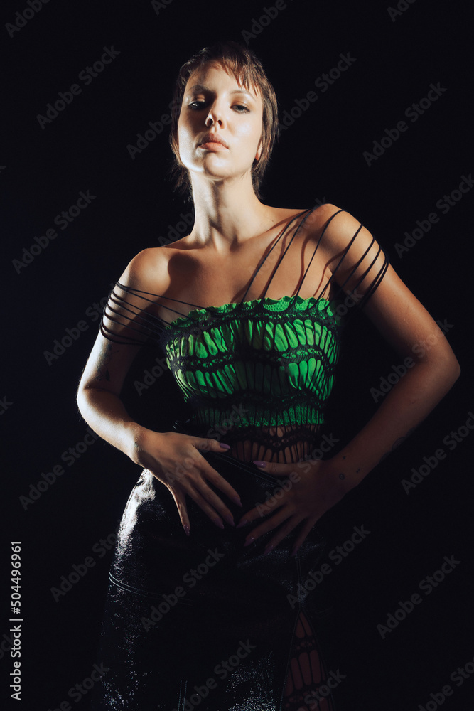 Top Model posing on black background. Stock Photo | Adobe Stock