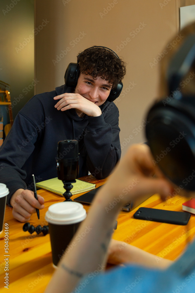 Radio host and guest laughing at joke Stock Photo | Adobe Stock