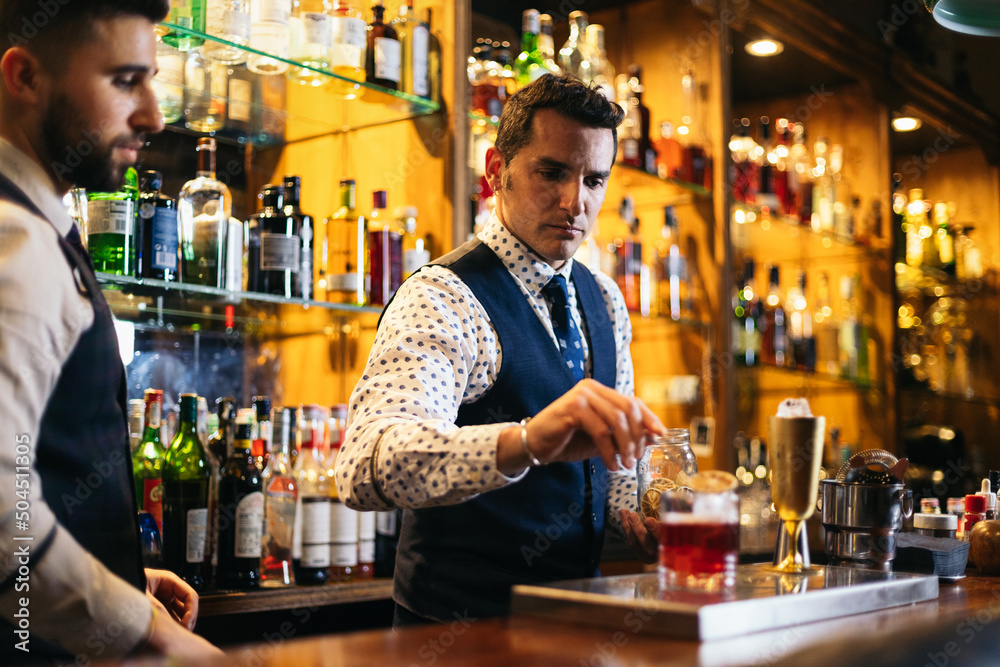 Professional team of bartenders working Stock Photo | Adobe Stock