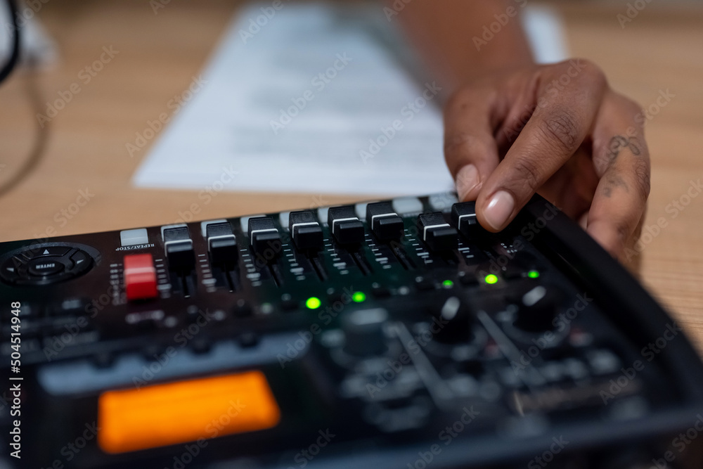 Crop person operating control panel in recording studio Stock Photo ...