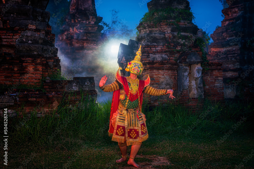 Masked giant dancing khon ramayana khon Ravana. Giant carrying a sword ...