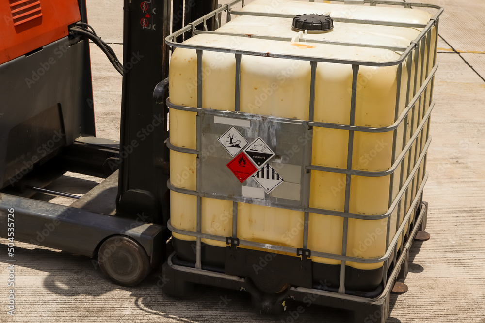 Warning symbol for chemical hazard on chemical container Stock Photo ...