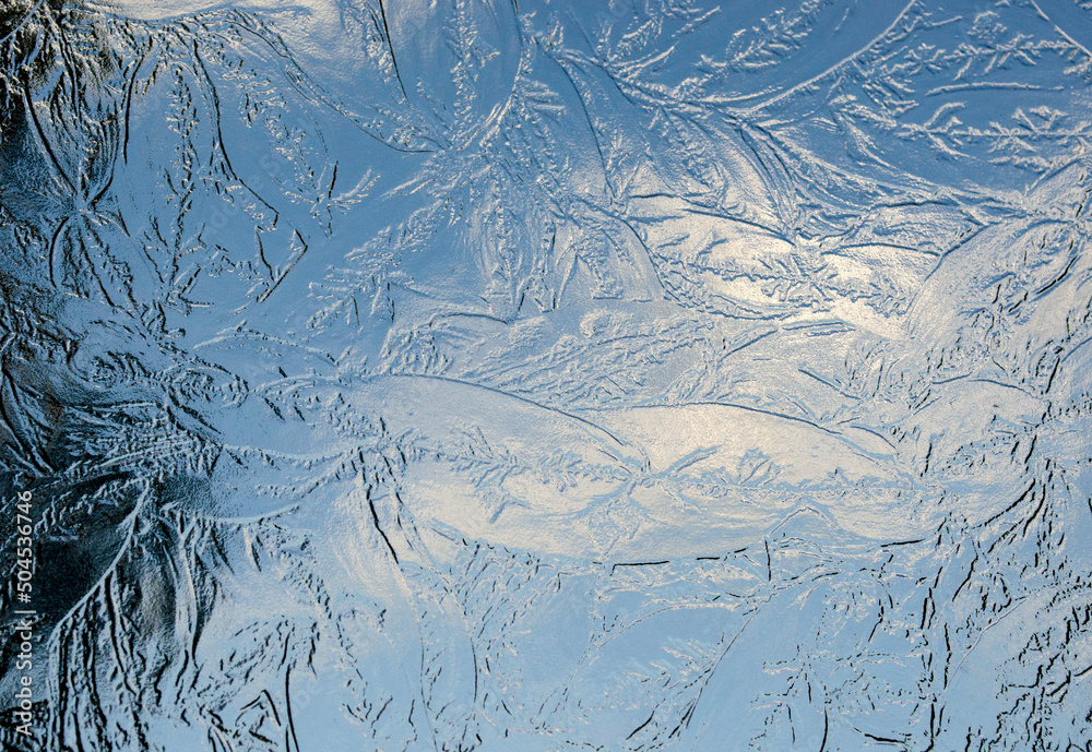 textured blue glass plastic surface lit behind closeup macro patterns ...