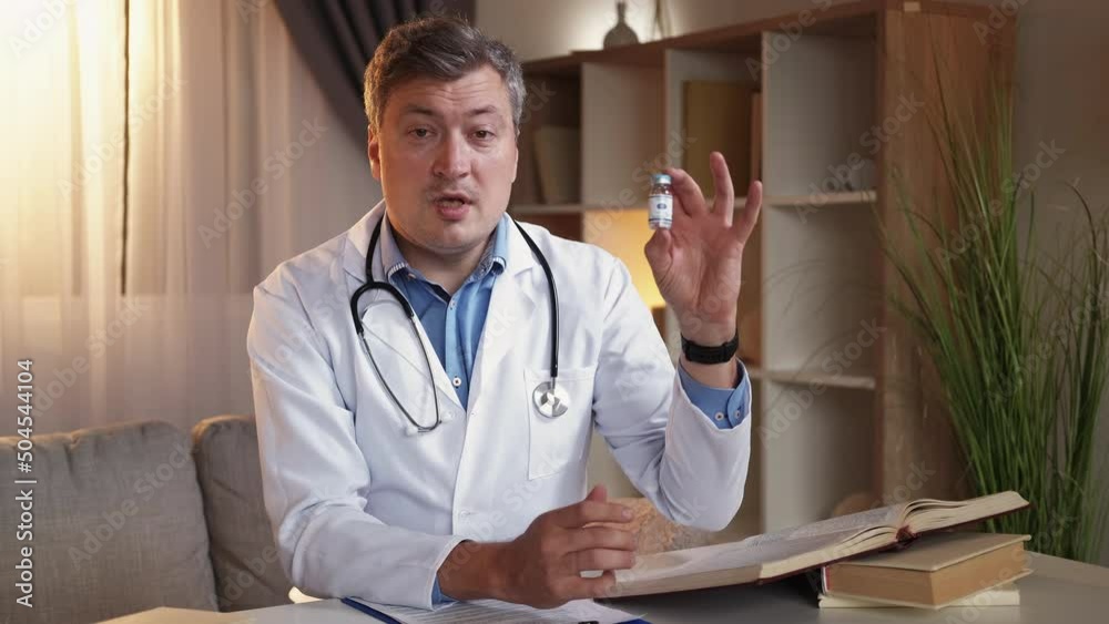 Professional lecture. Male doctor. Online education. Middle-aged man in ...
