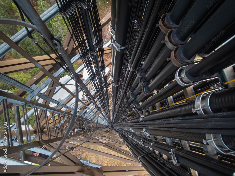 Overhead view of the telecommunication tower full of high-speed cables ...