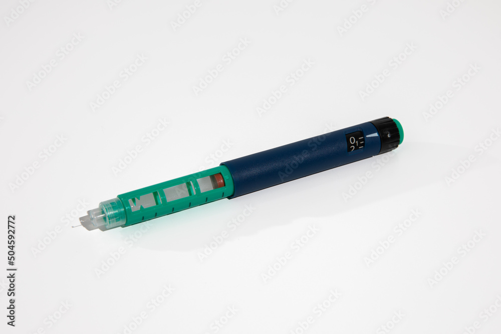 Insulin pen with needle tip isolated on white background. Medical ...