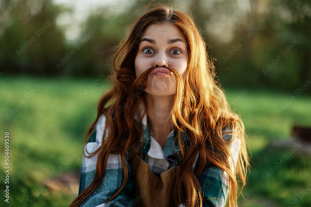 Funny woman portrait close-up laughing and wiggling for the camera in ...