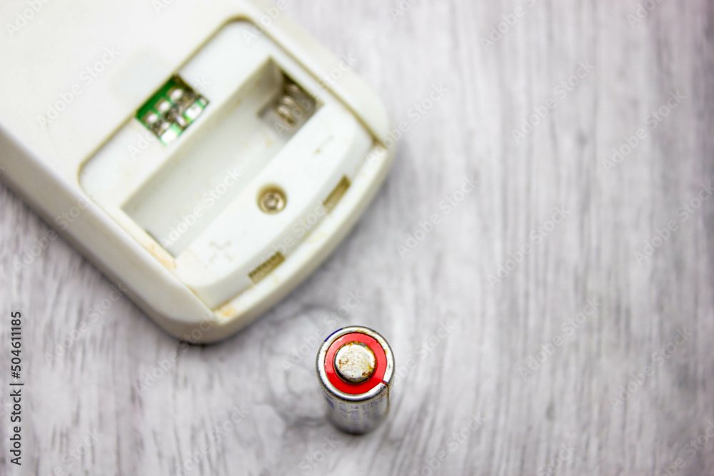 AA battery and remote control. Replacing the battery. Dead battery ...