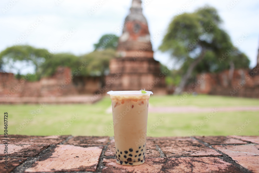 Taiwan ice milk tea with bubble boba, fresh drink and blur old temple ...