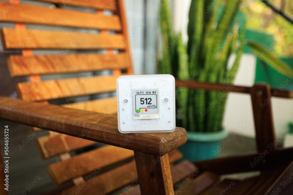 Smart home CO₂ sensor monitor. Indoor air quality sensor. Healthy work ...