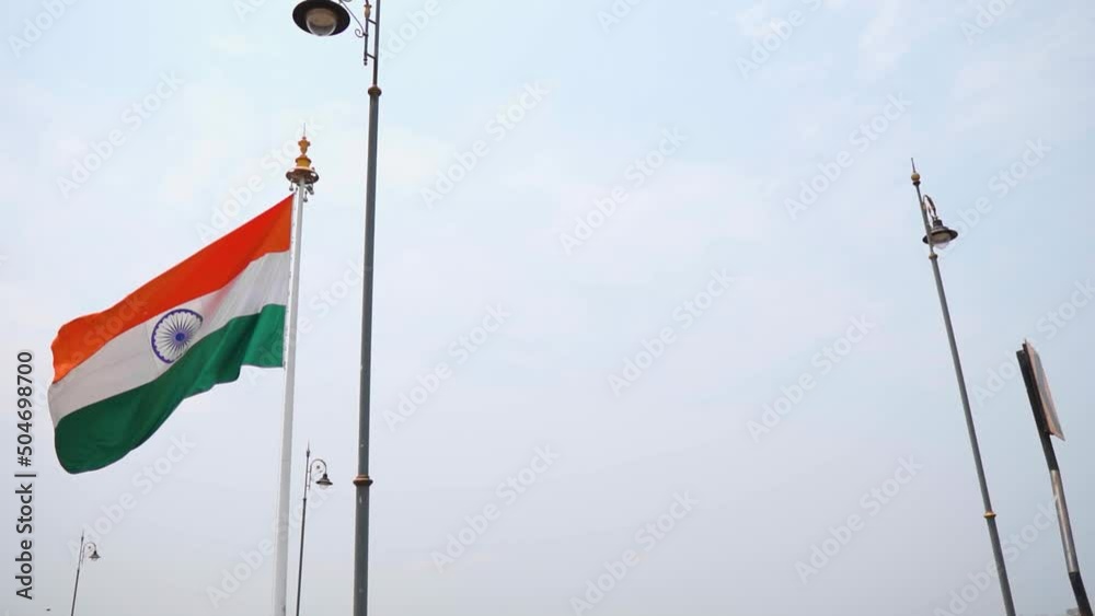 Slow motion shot of Indian flag waving in the wind on the side of the ...