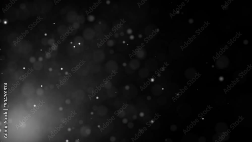 Abstract loop dust particles glow floating on black background with ...