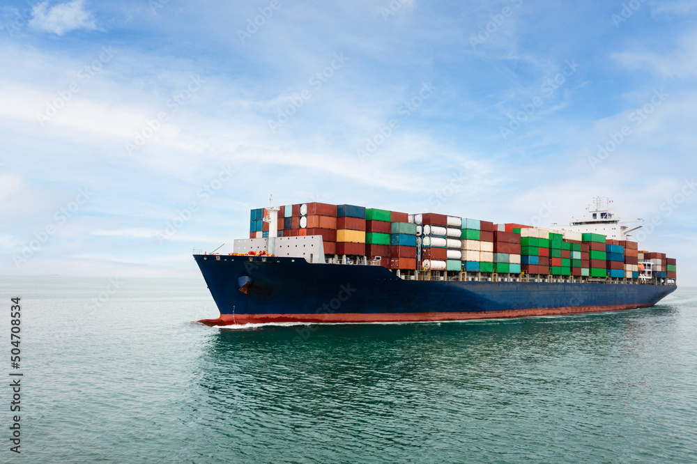 Big size container ship full speed sailing in deep sea for transporting ...