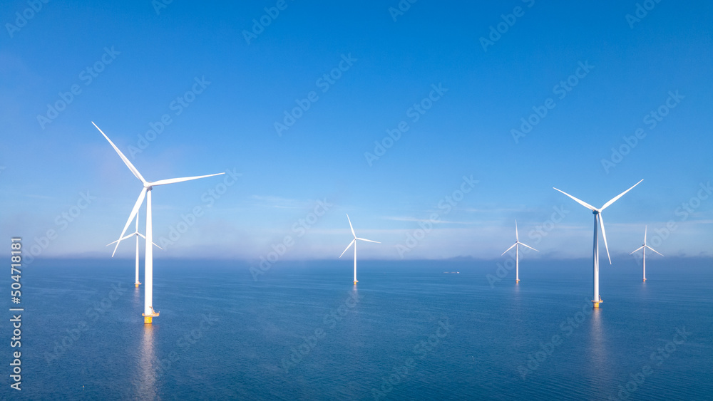 Offshore Windmill farm in the ocean Westermeerwind park, windmills ...