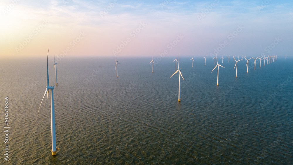 Offshore Windmill farm in the ocean Westermeerwind park, windmills ...