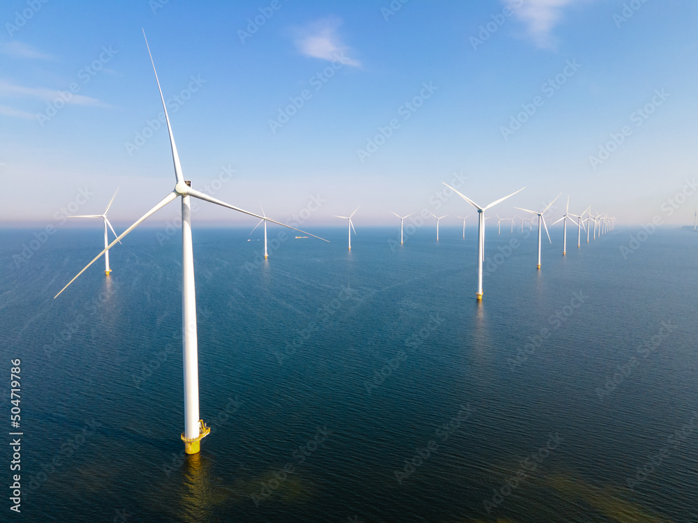 Offshore Windmill farm in the ocean Westermeerwind park, windmills ...