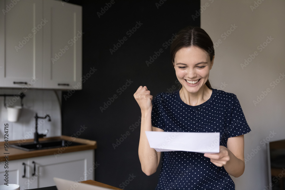 Joyful happy student girl excited with good news, making win hand ...