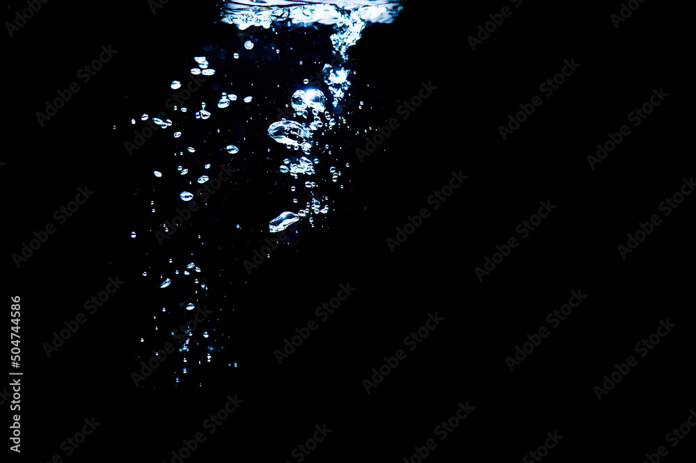 Water bubbles isolated on black background, close up view. Rippling ...
