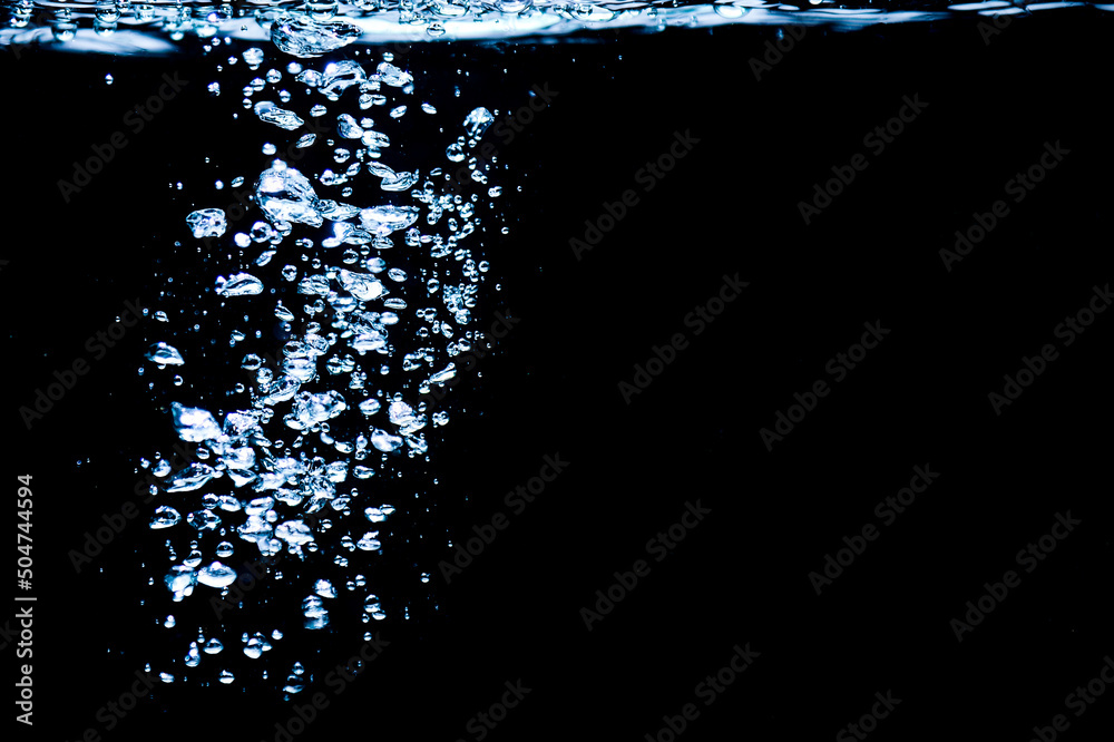 Water bubbles isolated on black background, close up view. Rippling ...