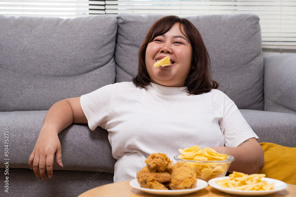 Young Asian oversize women gain weight while eating fried chicken ...