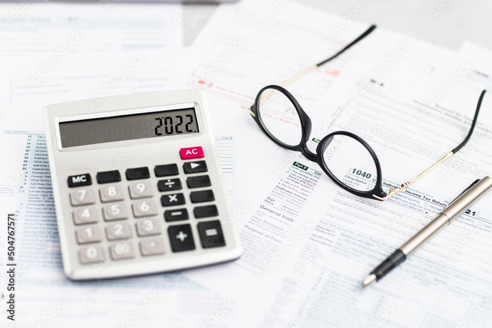 Flat lay of Individual income tax return form for tax payment on ...