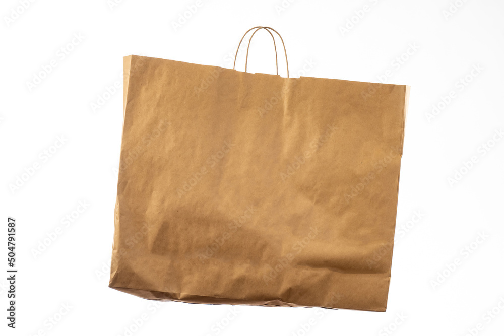 Paper bag on white. Simple paper shopping bag. Recycled shopping bag ...